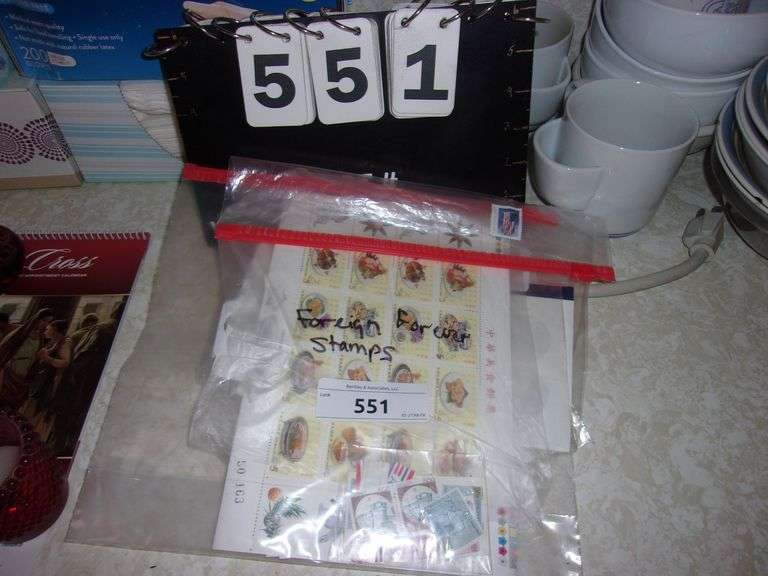 ASSORTED FOREIGN POSTAL STAMPS - Bentley & Associates, LLC