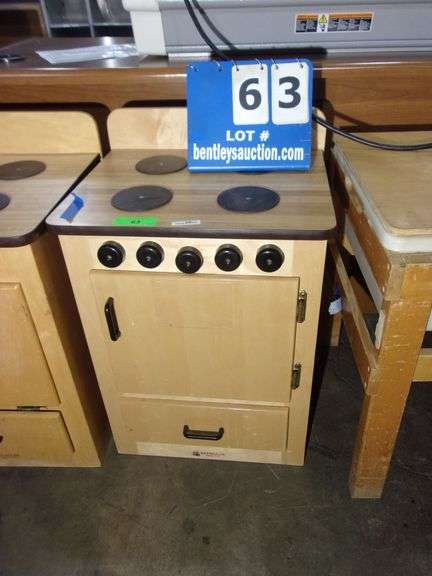 REYNOLDS BROWN WOODEN CHILDREN'S PLAY STOVE - Bentley & Associates, LLC