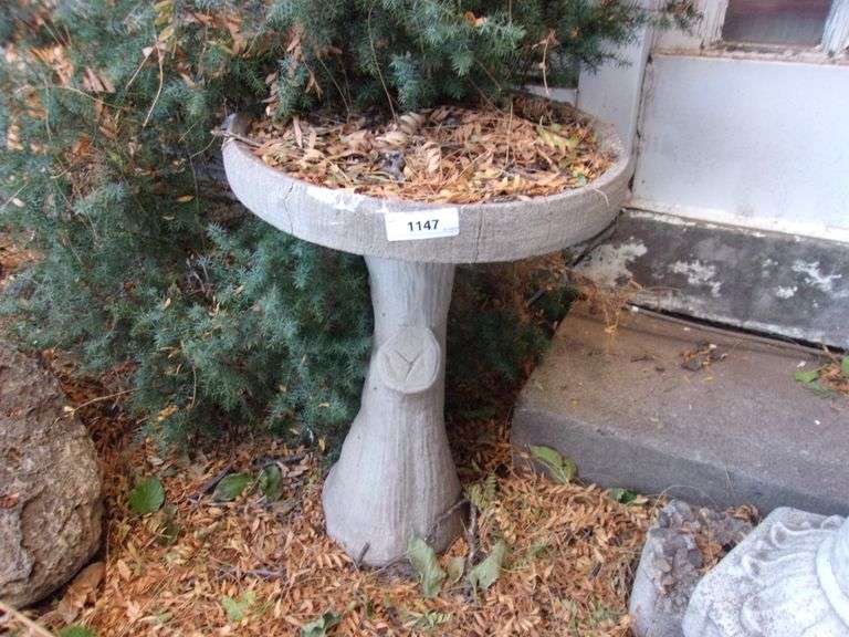 CONCRETE TREE TRUNK BIRD BATH - Bentley & Associates, LLC