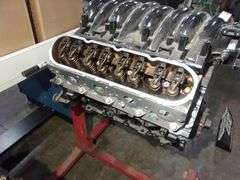 CHEVROLET 4.8 5.3 V8 ENGINE & RED ENGINE STAND - Bentley & Associates, LLC