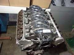 CHEVROLET 4.8 5.3 V8 ENGINE & RED ENGINE STAND - Bentley & Associates, LLC