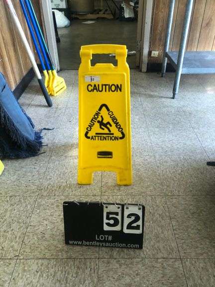 PLASTIC YELLOW CAUTION SIGN - Bentley & Associates, LLC