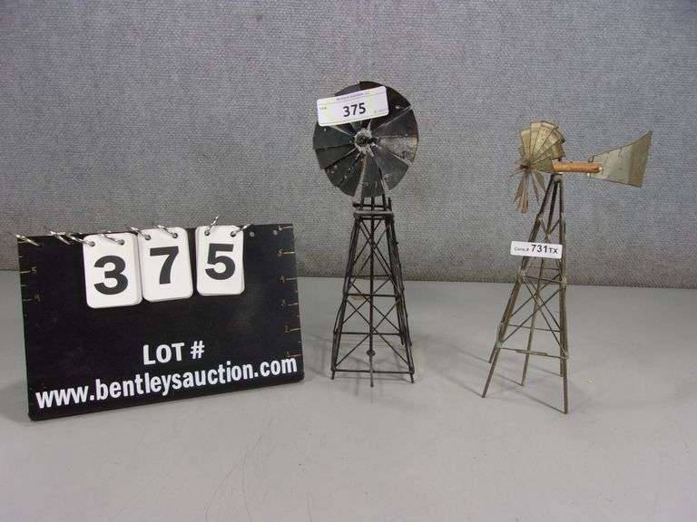 2 SMALL METAL WINDMILLS - Bentley & Associates, LLC