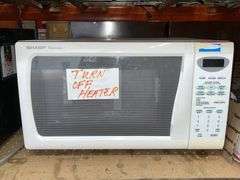 SHARP CAROUSEL R-310EW MICROWAVE OVEN - Bentley & Associates, LLC