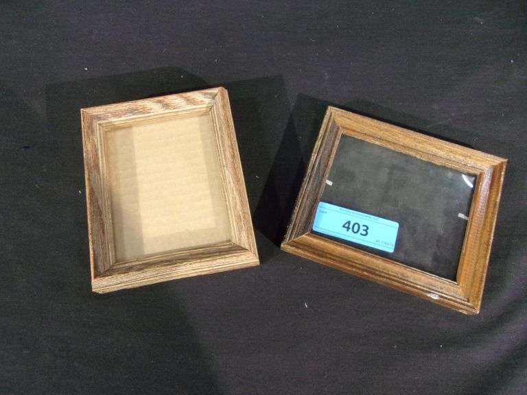 LOT: 2 SMALL NATURAL STAIN WOOD FRAMES 6 X 5 - Bentley & Associates, LLC