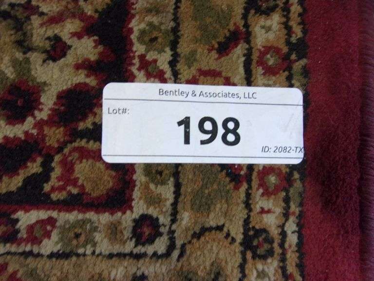 RED AND TAN DALTORIO AREA RUG - 5'3" X 7'6" ****LOCATED AT APARTMENT ...