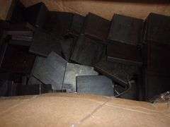 PALLET: BOXES OF METAL SQUARE SLABS - Bentley & Associates, LLC