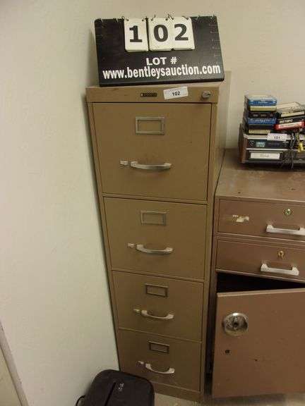 ANDERSON HICKEY 4-DRAWER BROWN FILING CABINET - Bentley & Associates, LLC