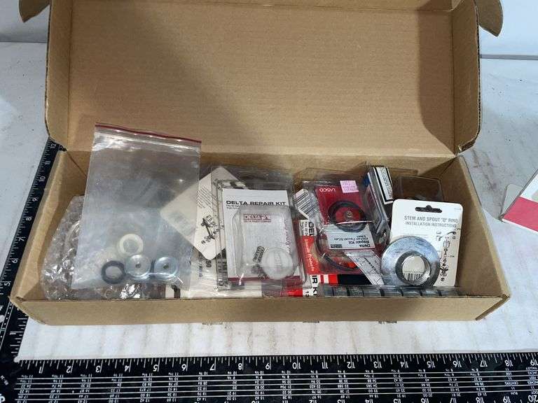 BOX: ASSORTED FAUCET REPAIR PARTS - Bentley & Associates, LLC