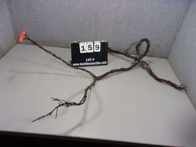 TWISTED BARBED WIRE MAN ART - Bentley & Associates, LLC