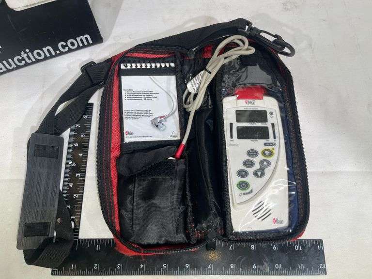 MASIMO RAD 57 HANDHELD PULSE OXIMETER - Bentley & Associates, LLC