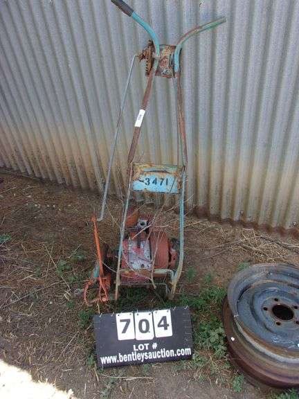 ANTIQUE JOHN DEERE GARDEN TRIMMER - Bentley & Associates, LLC