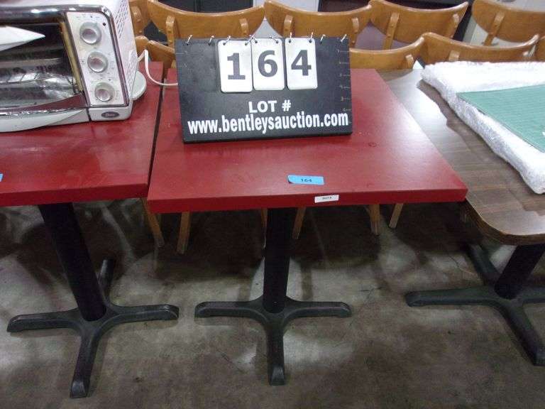 METAL FOOTED RED COMPRESSED WOOD TOP TABLE - Bentley & Associates, LLC