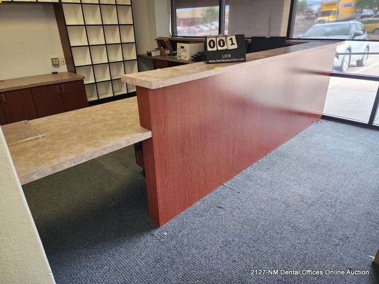 L-SHAPED LOBBY COUNTERTOP W/ CABINETS - Bentley & Associates, LLC