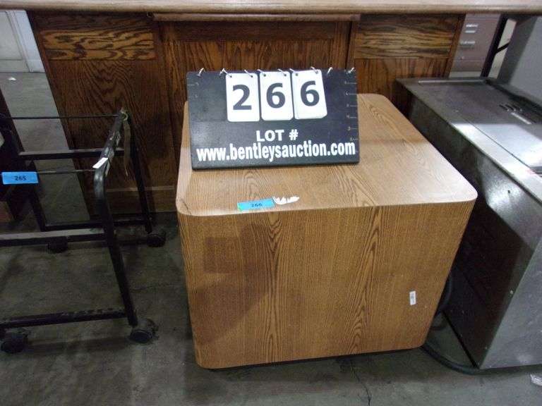 BROWN WOODEN BLOCK-SHAPED SIDE TABLE - Bentley & Associates, LLC