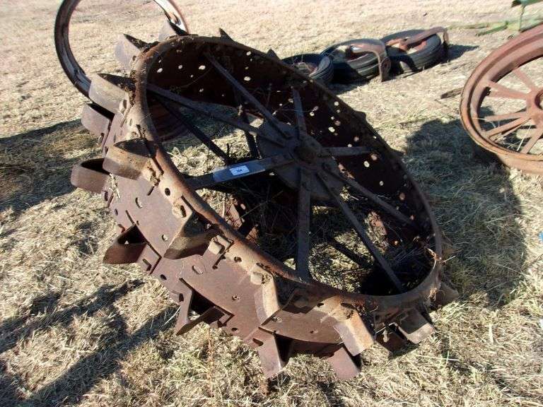 8-SPOKE VINTAGE STEEL TRACTOR WHEEL - Bentley & Associates, LLC