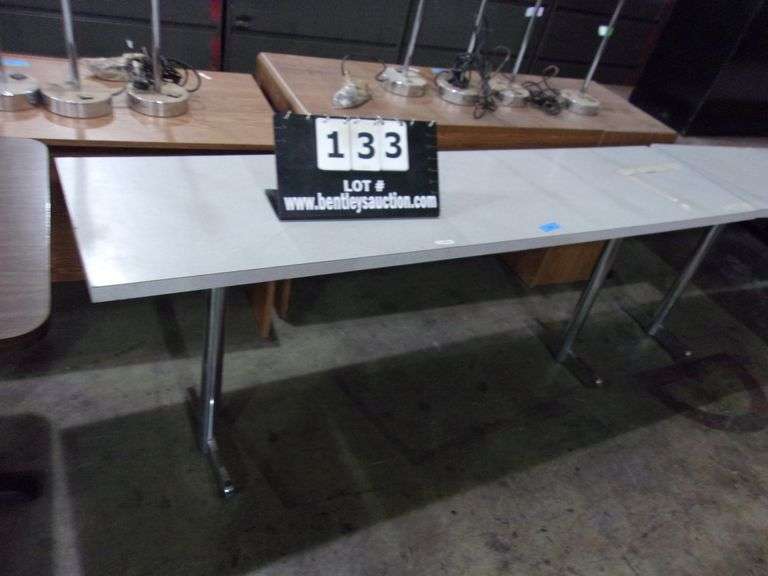 METAL LEGGED COMPRESSED WOOD TOP TABLE - Bentley & Associates, LLC