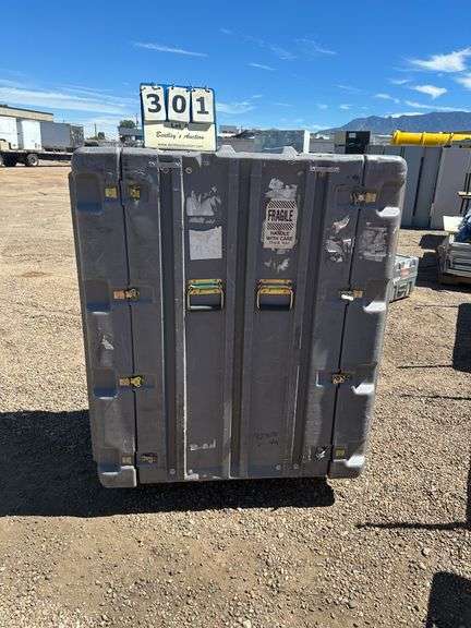 SHIPPING CONTAINER ON ROLLERS - Bentley & Associates, LLC