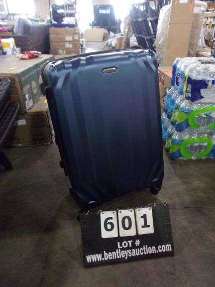 SAMSONITE BLUE HARD SHELL LOCKABLE SUITCASE - Bentley & Associates, LLC