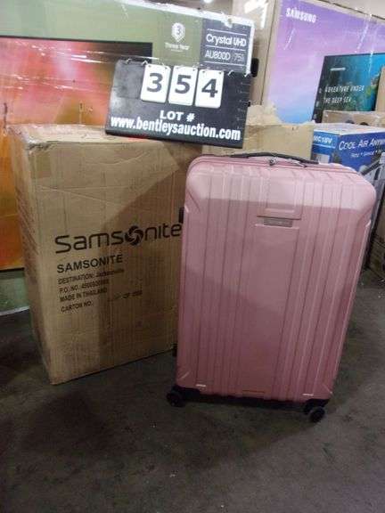 SAMSONITE PINK HAED SHELL SUITCASE - Bentley & Associates, LLC