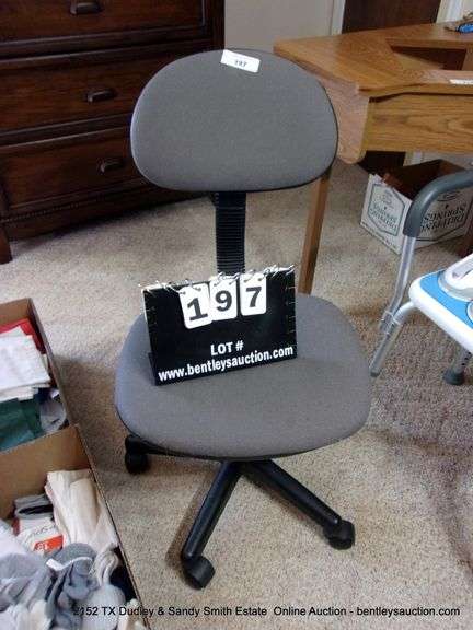 CASTERED CHAIR W/ GREY CUSHION - Bentley & Associates, LLC