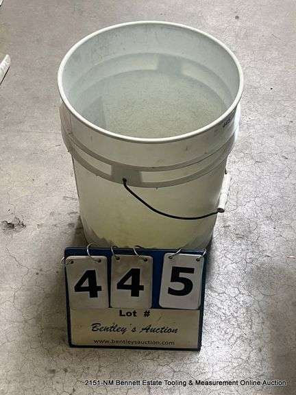 5-GALLON BUCKET: 45 CAL SHELL CASINGS - Bentley & Associates, LLC