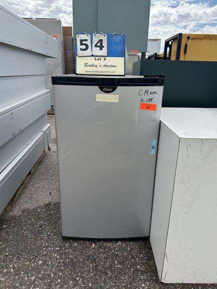 OSTER MINI FRIDGE - Bentley & Associates, LLC