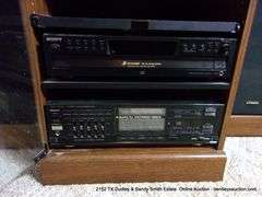 FISHER STEREO CABINET AND VHS PLAYERS - Bentley & Associates, LLC