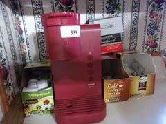 KEURIG PINK COFFEE MAKER & ASSORTED K-CUPS - Bentley & Associates, LLC