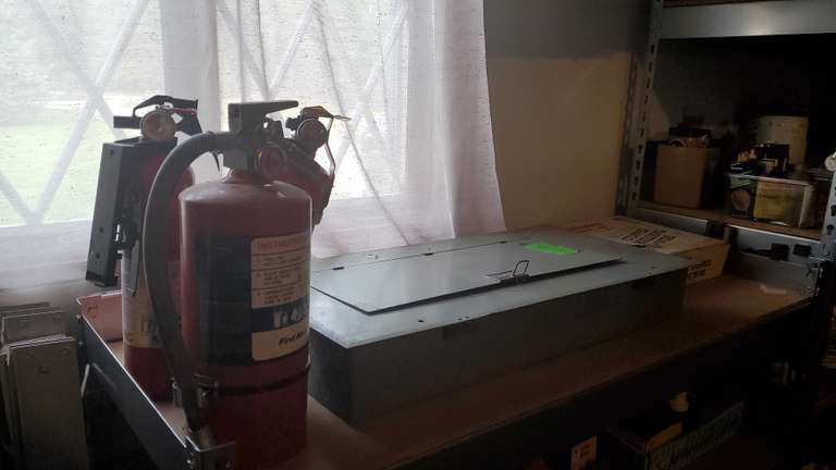 GE load box fuse panel, three fire extinguishers, indoor copper ...