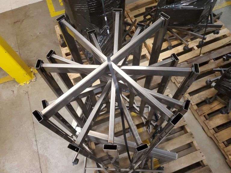 Four-way racks on casters. Brushed stainless finish.24x48 Includes ...