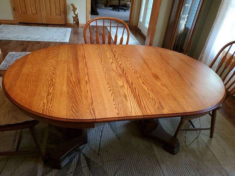 Richardson Brothers oak dining table with 2 leaves installed and 6 ...