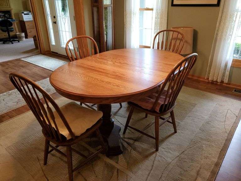 Richardson Brothers oak dining table with 2 leaves installed and 6 ...