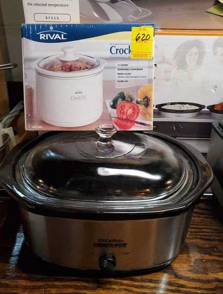Two rival crock pots (1.5 qt... appears to be new in box.) Basement ...