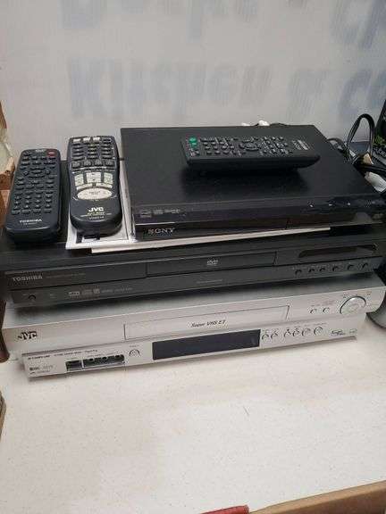 Sony and Toshiba DVD players with remotes, JVC super VHS player with ...