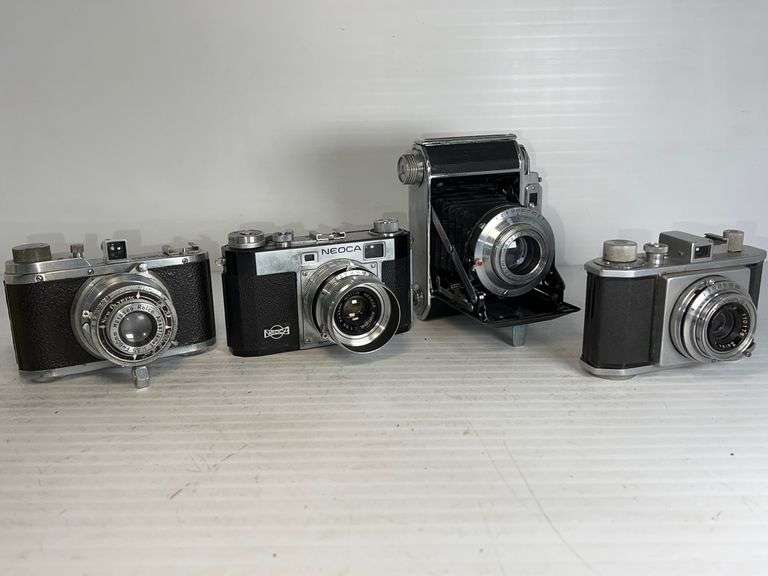 Four interesting collectible cameras - Bid-Assets Online Auctions