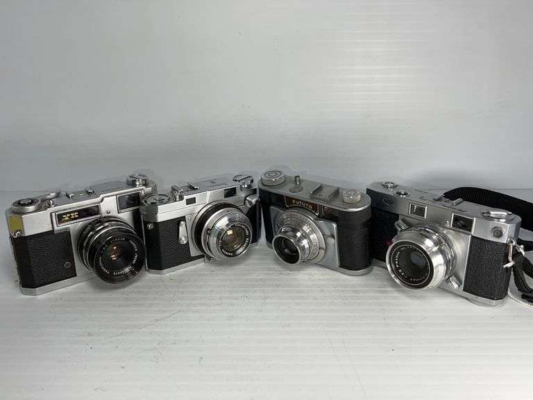 Four Japanese 35 mm cameras - Bid-Assets Online Auctions