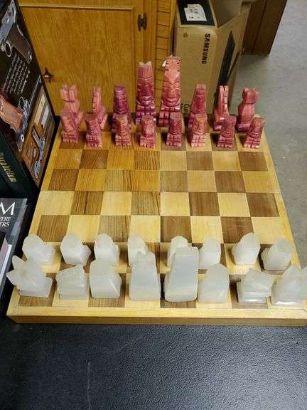Carved stone Tiki chess set - Bid-Assets Online Auctions