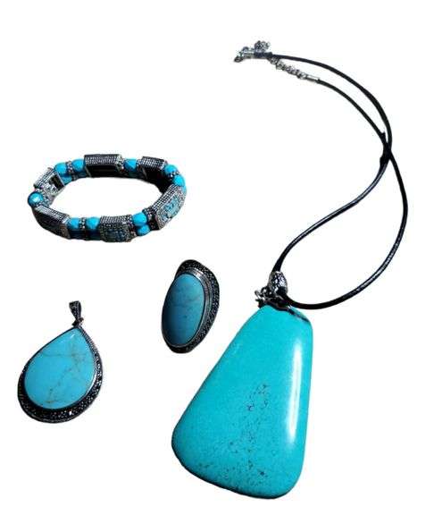 Turquoise color stone jewelry includes bracelet, pendants and ring ...