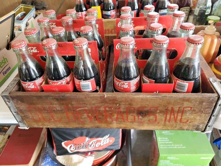 GCC beverages wood crate with four Coca-Cola classic bottle six packs ...