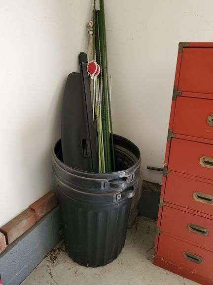 Two trash can and assorted driveway markers - Bid-Assets Online Auctions