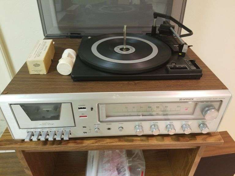 Symphonic cassette stereo music system with turntables, speakers, AV ...