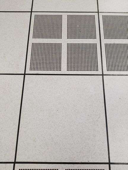 Modular elevated network room floor includes 24x24 modular tiles, vents ...