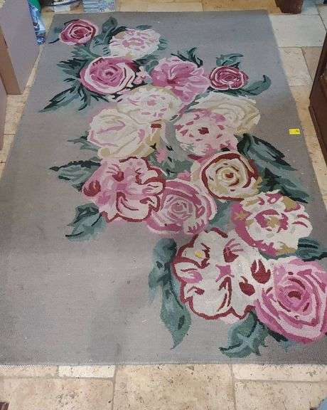 5x8 area rug...Located entrance near garage - Bid-Assets Online Auctions