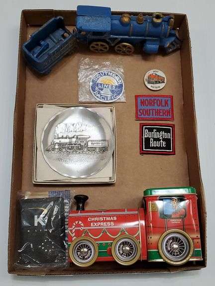 Box of assorted train related items including cast iron Steam ...
