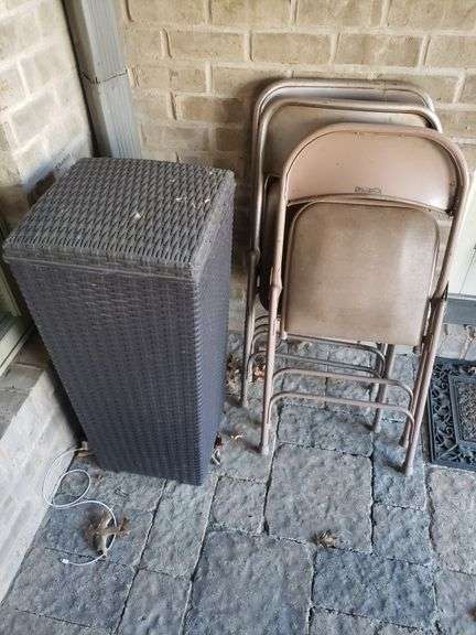 Group of three metal folding chairs and wicker style trash container ...