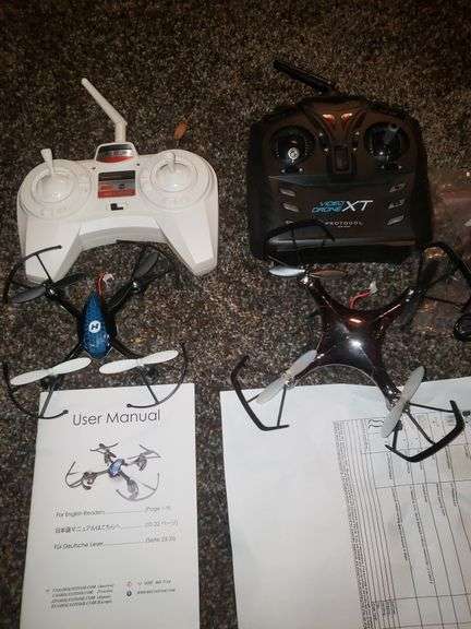 Two drones with remote controls including holy stone and protocol New ...