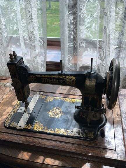 White SM Co treadle sewing machine - Bid-Assets Online Auctions
