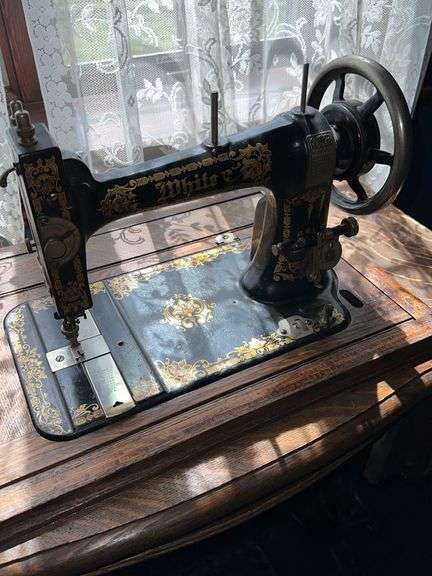 White SM Co treadle sewing machine - Bid-Assets Online Auctions