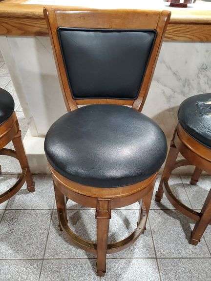 Black padded swivel bar stools. X5 (6th included with damaged seat ...